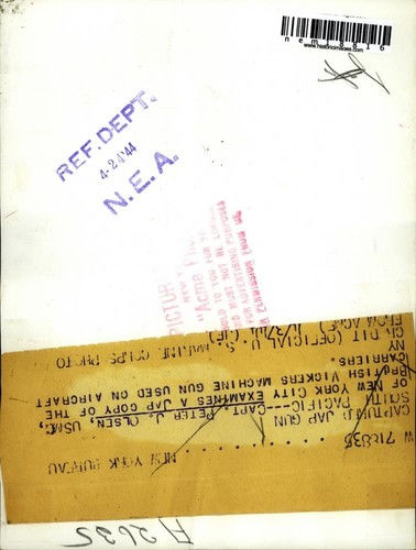 1944 Press Photo WWII South Pacific, Capt. Peter Olsen examines a ...