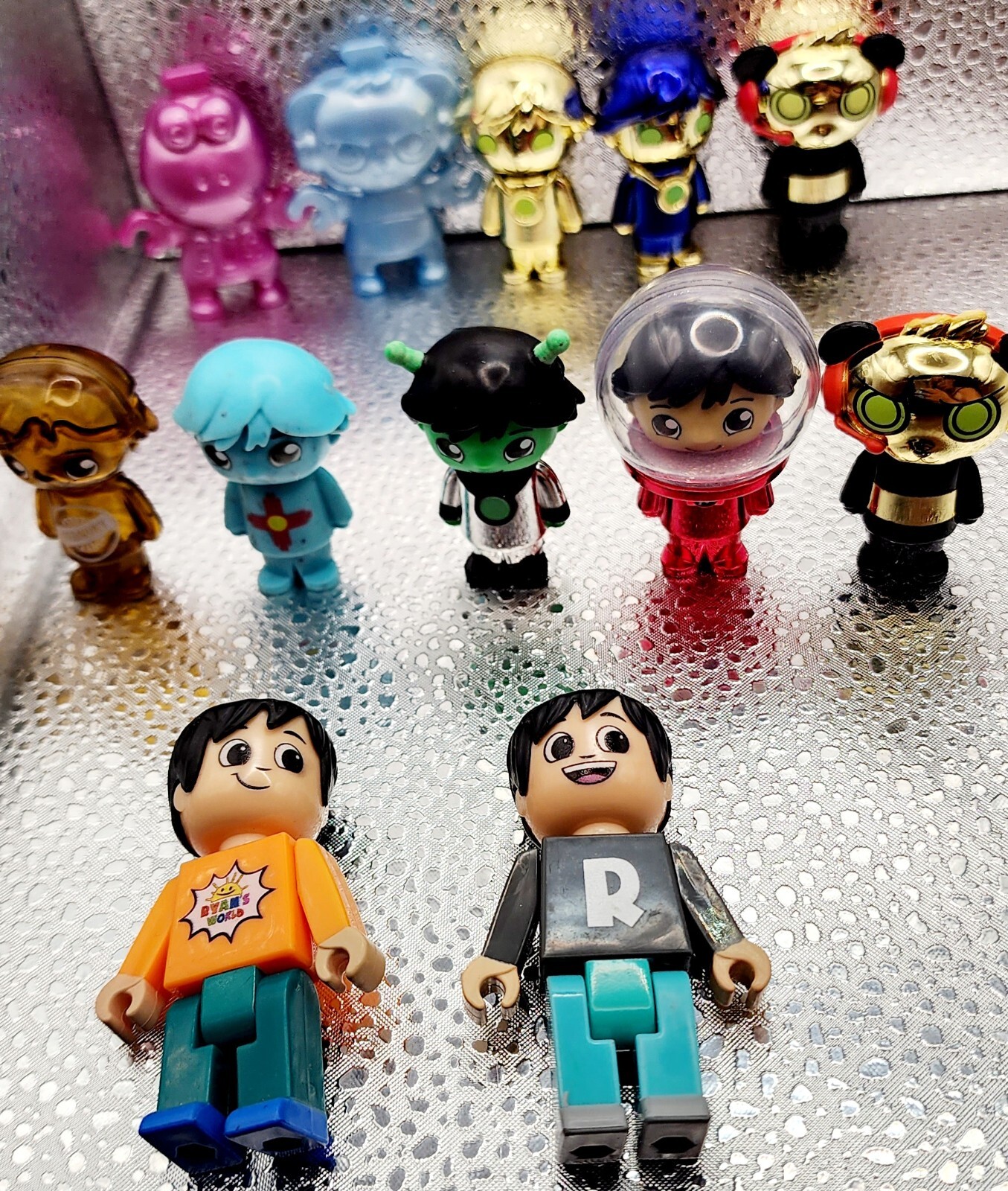 Ryan's World figures 12 pc lot, some rare figures, 1 amber transluscent ...