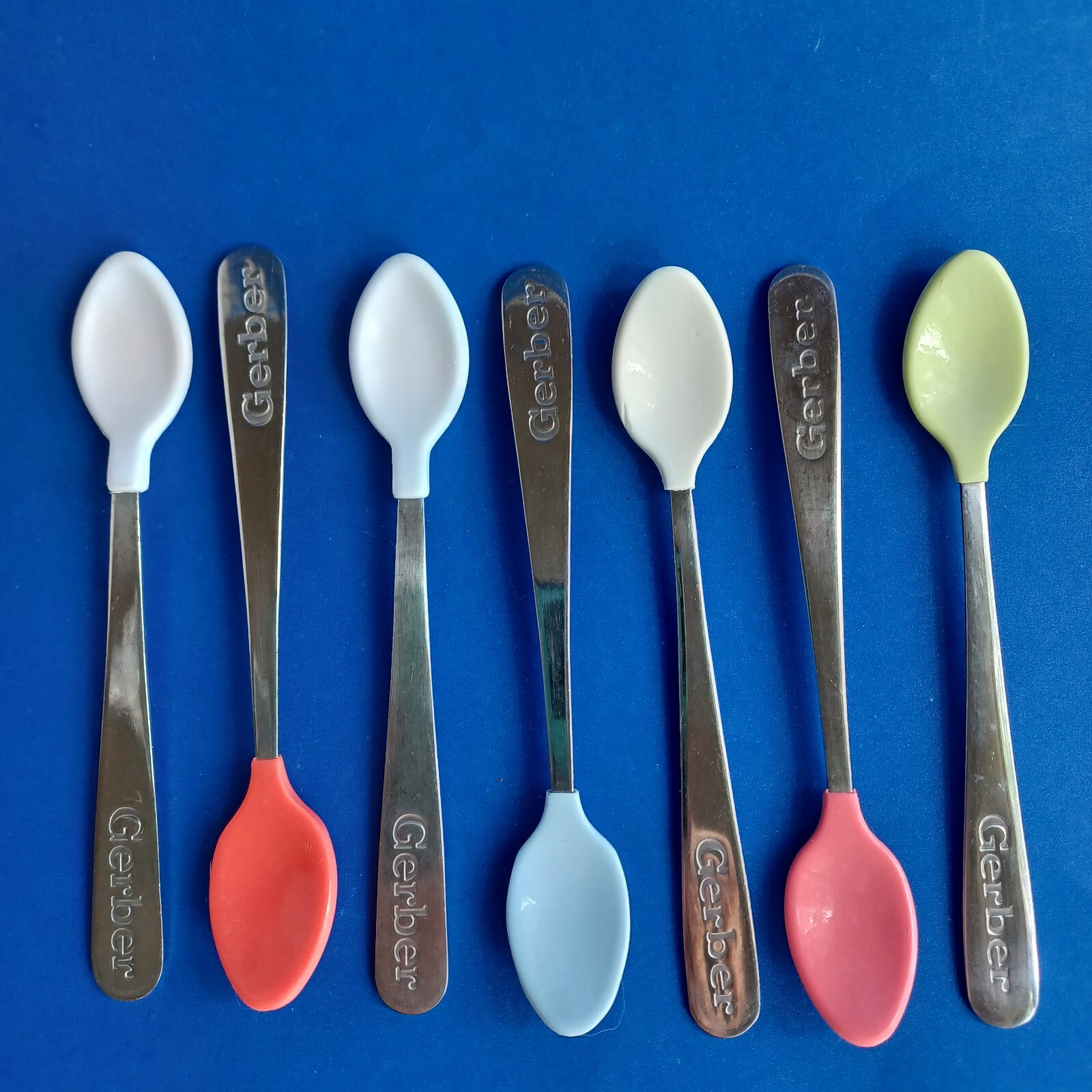 GERBER Lot of 7 baby spoons soft tip Made In USA Stainless Multi Colors ...