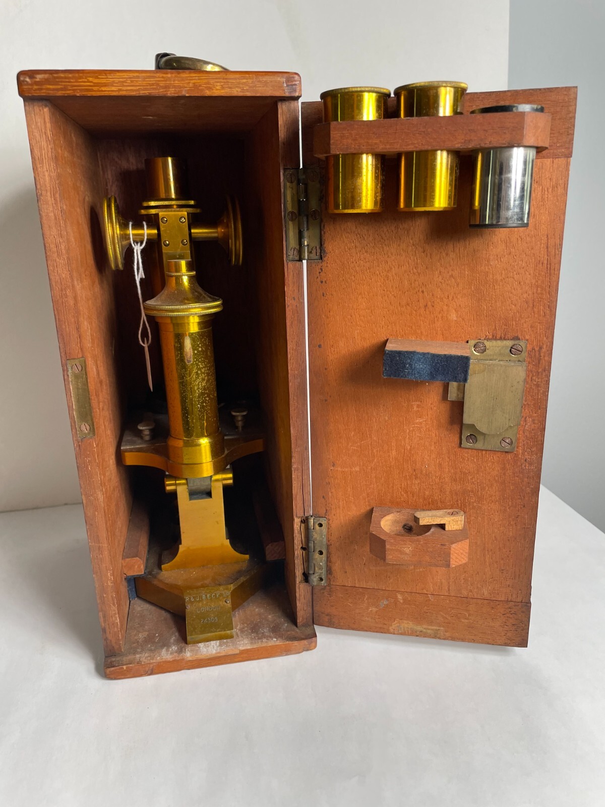 Antique signed R&J Beck Microscope C 1890 with case and a few ...