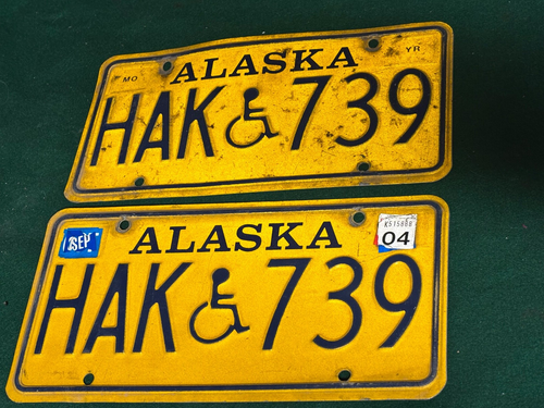 TWO MATCHING PAIR ALASKA HANDICAP LICENSE PLATES STAMPED HAK 739 with ...