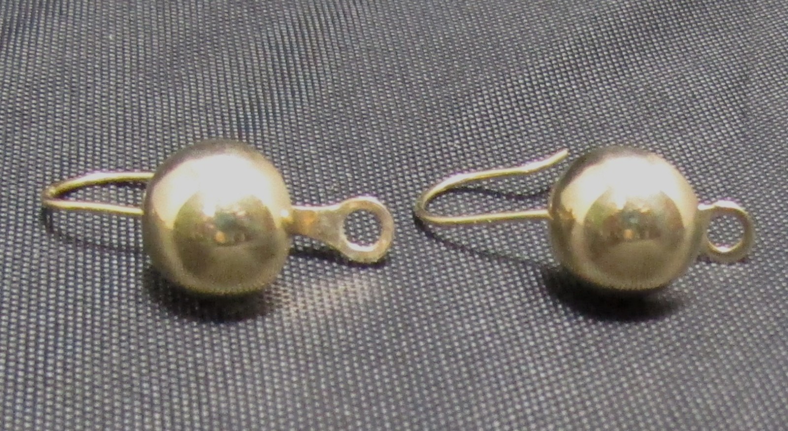 Small gold tone pierced round ball earrings leaver backs 1 mm light ...