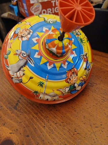 vintage 1950's spinning top boy leading a donkey | eBay