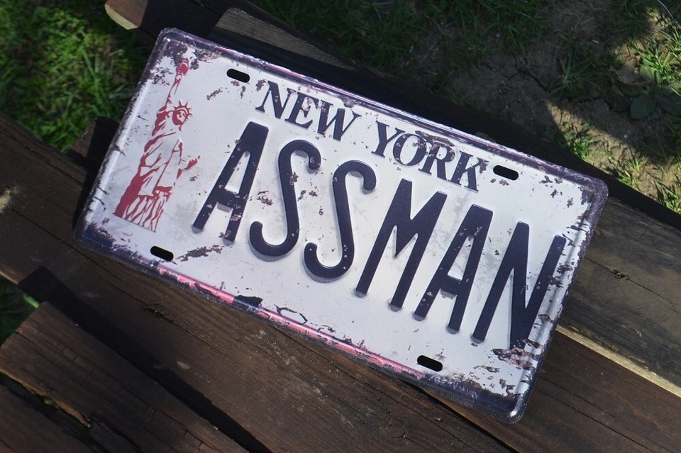 New York ASSMAN Novelty License Plate Tin Sign - Jerry Seinfeld - Cosmo ...