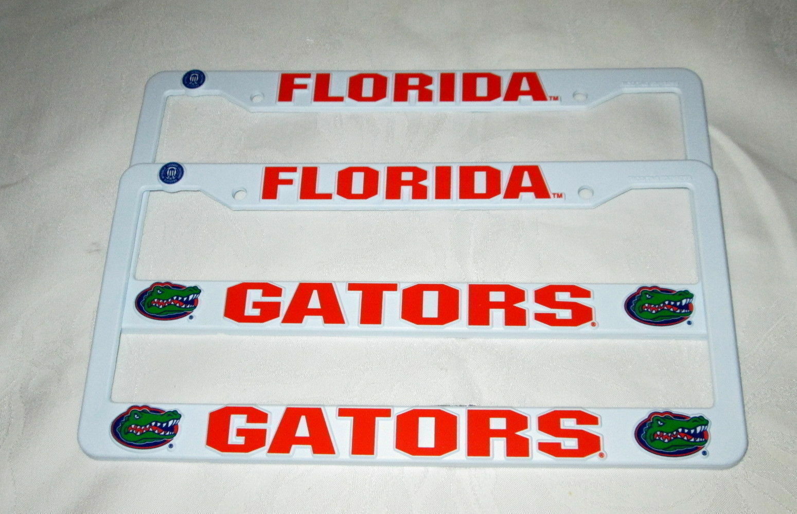 TWO (2) FLORIDA GATORS EMBOSSED LICENSE PLATE FRAMES #12 - NEW | eBay