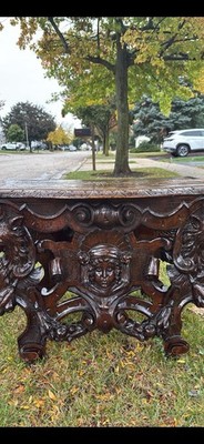 Carved walnut Renaissance Revival center table with ornate figural base ...