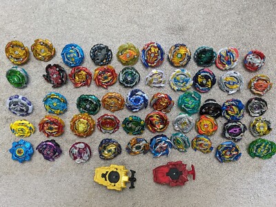 Beyblade lot of Takara Tomy Burst Beyblades + String Launcher | eBay