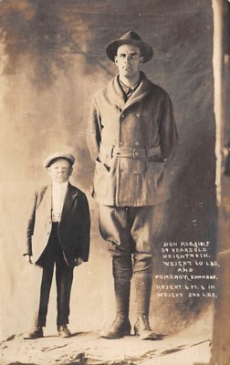 46 INCH MAN & 6 FOOT 6 INCH MAN POSE NEXT TO EACH OTHER, REAL PHOTO PC ...