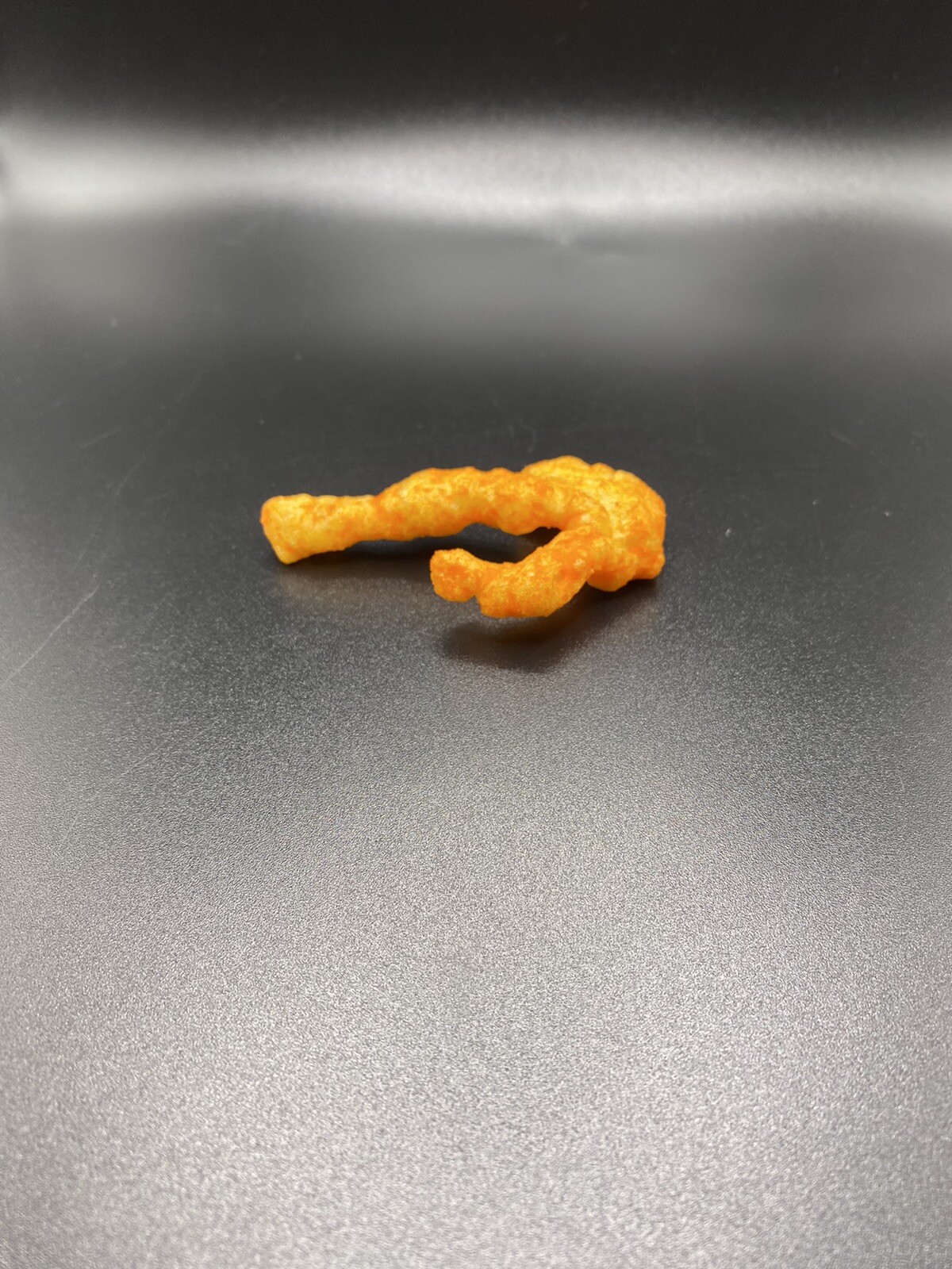 Crunchy Cheeto shaped like a ship’s Anchor or Arrow. | eBay