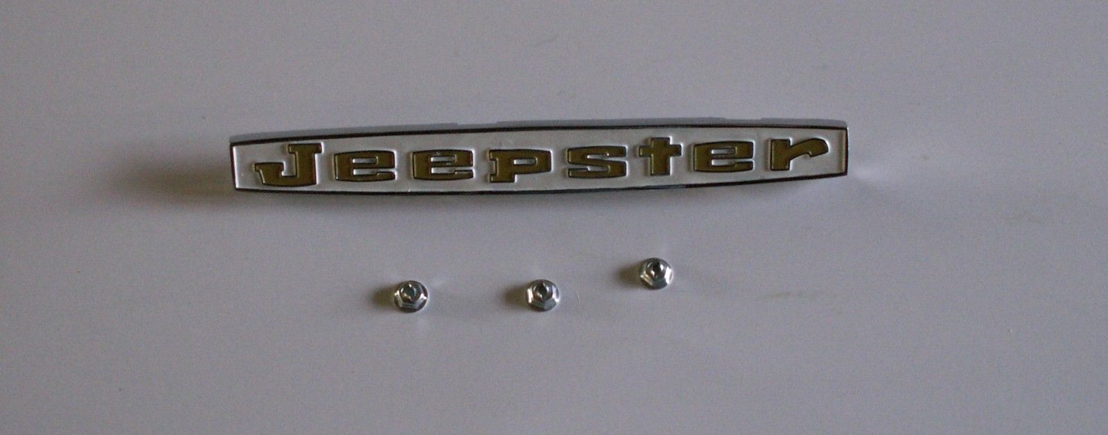 Jeepster, hood emblem (gold letters) | eBay
