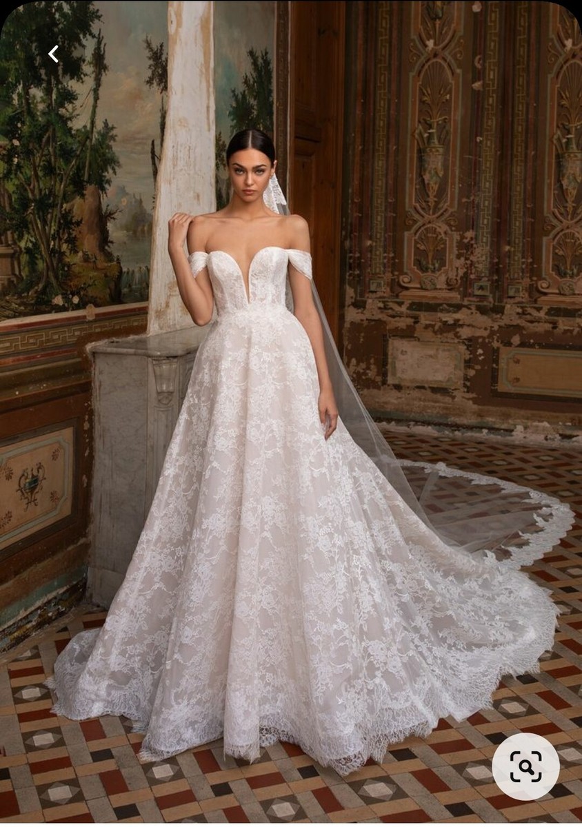 Lace Wedding Dress With Off The Shoulder Sleeves And Open Back