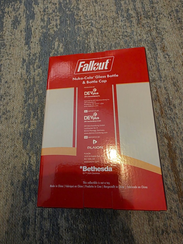 Nuka Cola Glass Bottle - Official Fallout Merch + 10 Bottle Caps brand ...