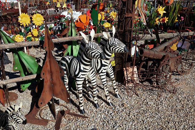 Colorful metal-art product displayed outside Casa Cristal Pottery home ...