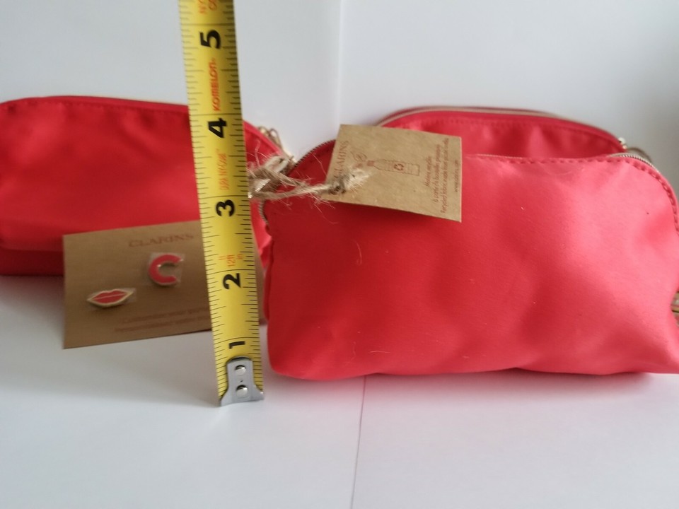 CLARINS PINK COSMETIC TRAVEL BAG WITH CLARINS LOGO PINS . BUY 1,2 OR 3 ...