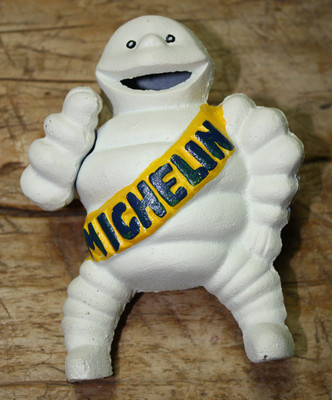 Cast Iron MICHELIN MAN Cave SIGN DISPLAY DOORSTOP PAPERWEIGHT Coin Bank ...