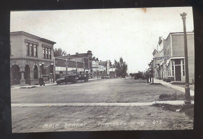 REAL PHOTO THOMPSON IOWA DOWNTOWN STREET SCENE DIRT ROAD POSTCARD COPY ...