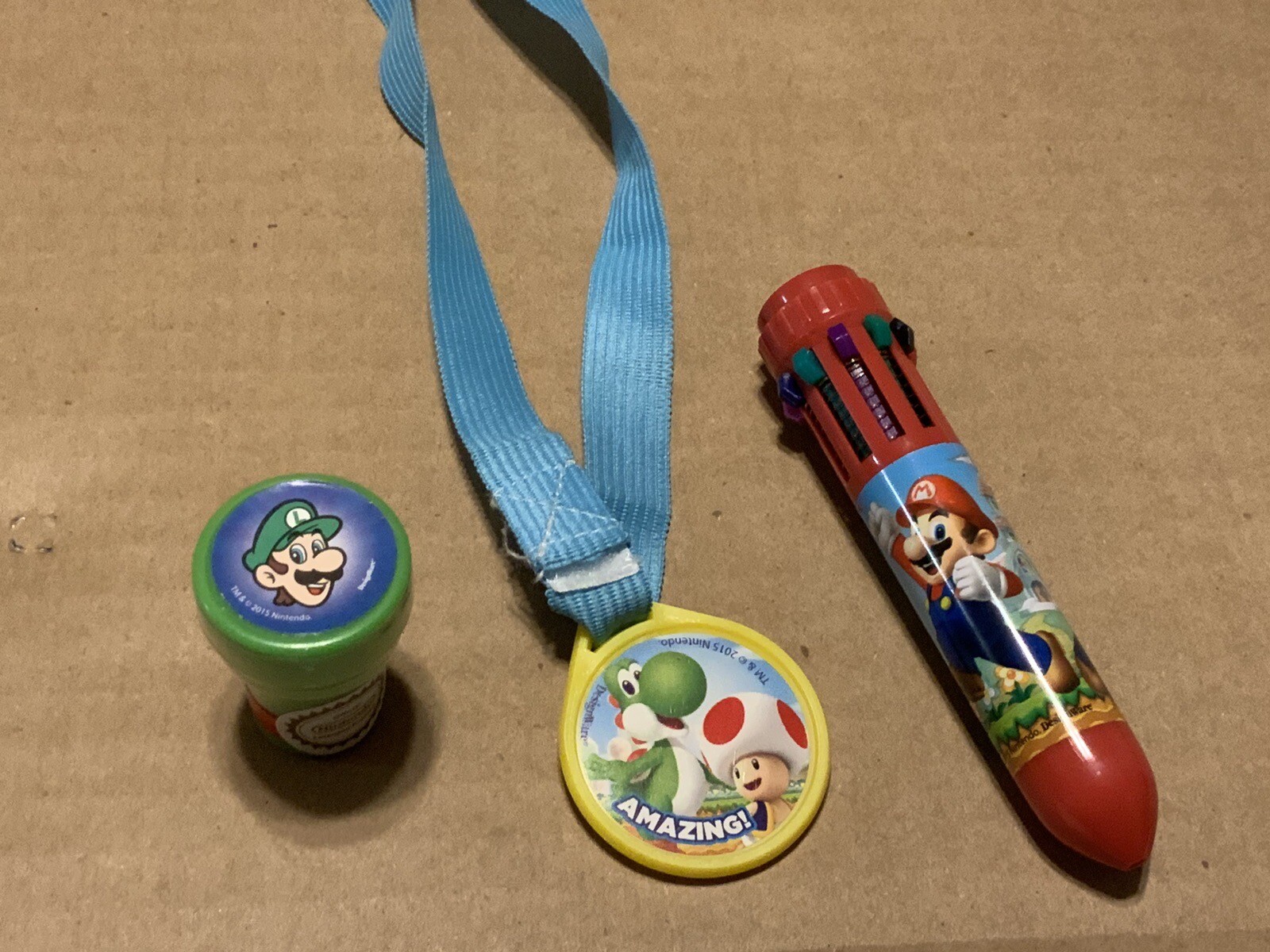 Super Mario Multi-colored pen, Luigi Stamp, and Yoshi & Toad plastic ...