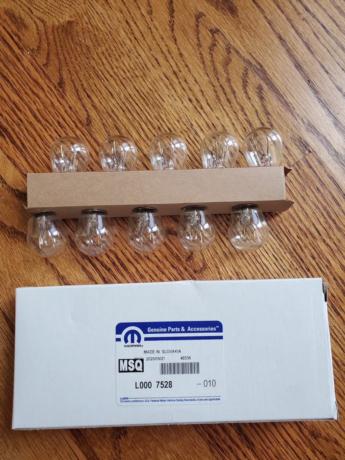 Genuine Mopar Tail Lamp Bulb L0007528 - new box of 10 | eBay