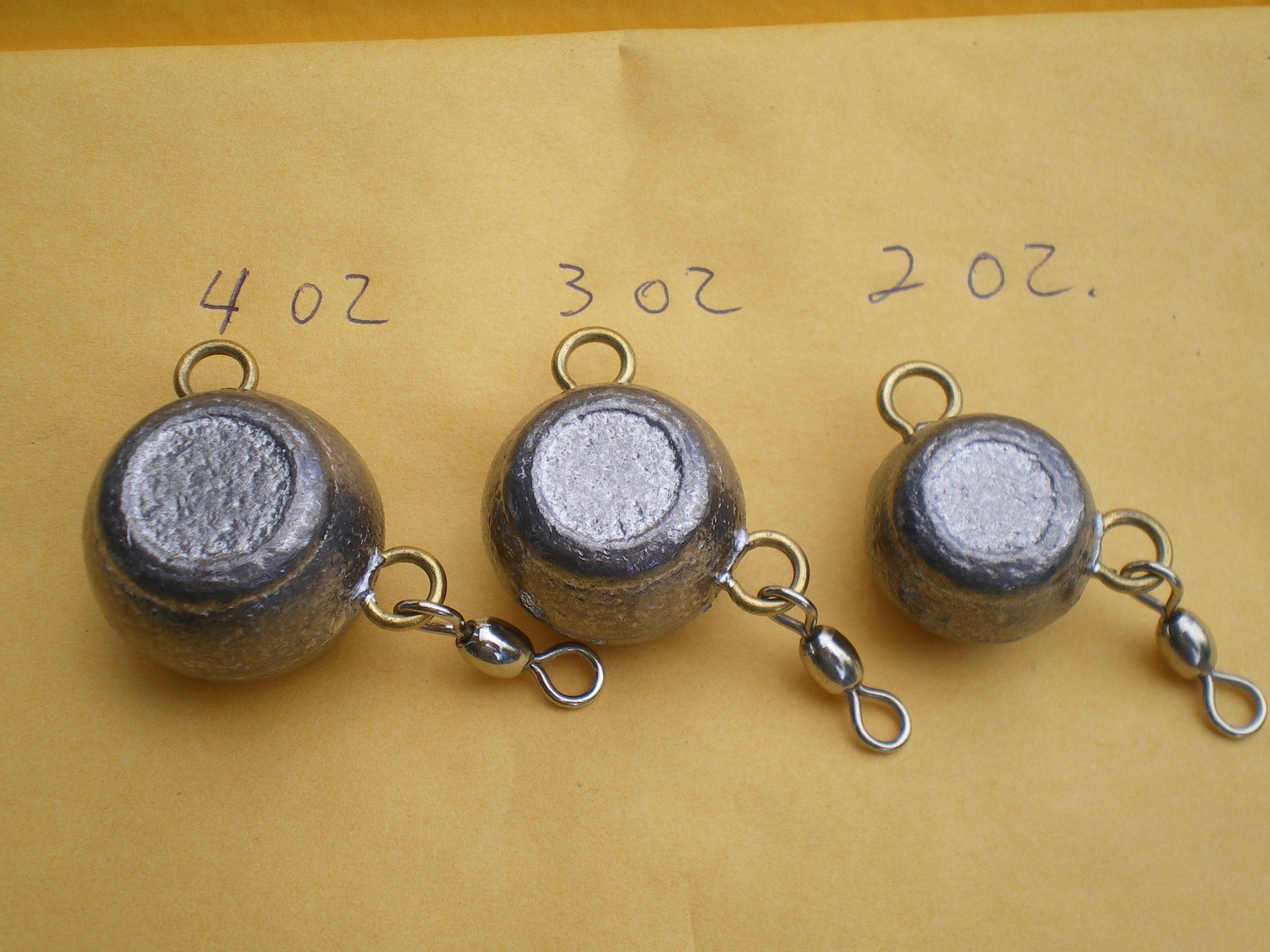 9 PCS. FLUKE EAR BALL JIGS, W/#1 CRANE SWIVEL, 2,3,4 OZ. 3 EACH ...