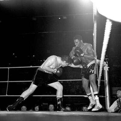 Jimmy Young cuffs John L Gardner a short right Brit throws a l- 1979 ...