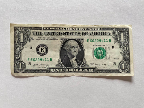 One dollar bill serial number E 66229411 B $1 Note US Real money 2017 ...