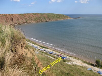 Photo 6x4 Filey Sailing Club View from the clifftop at high tide over ...