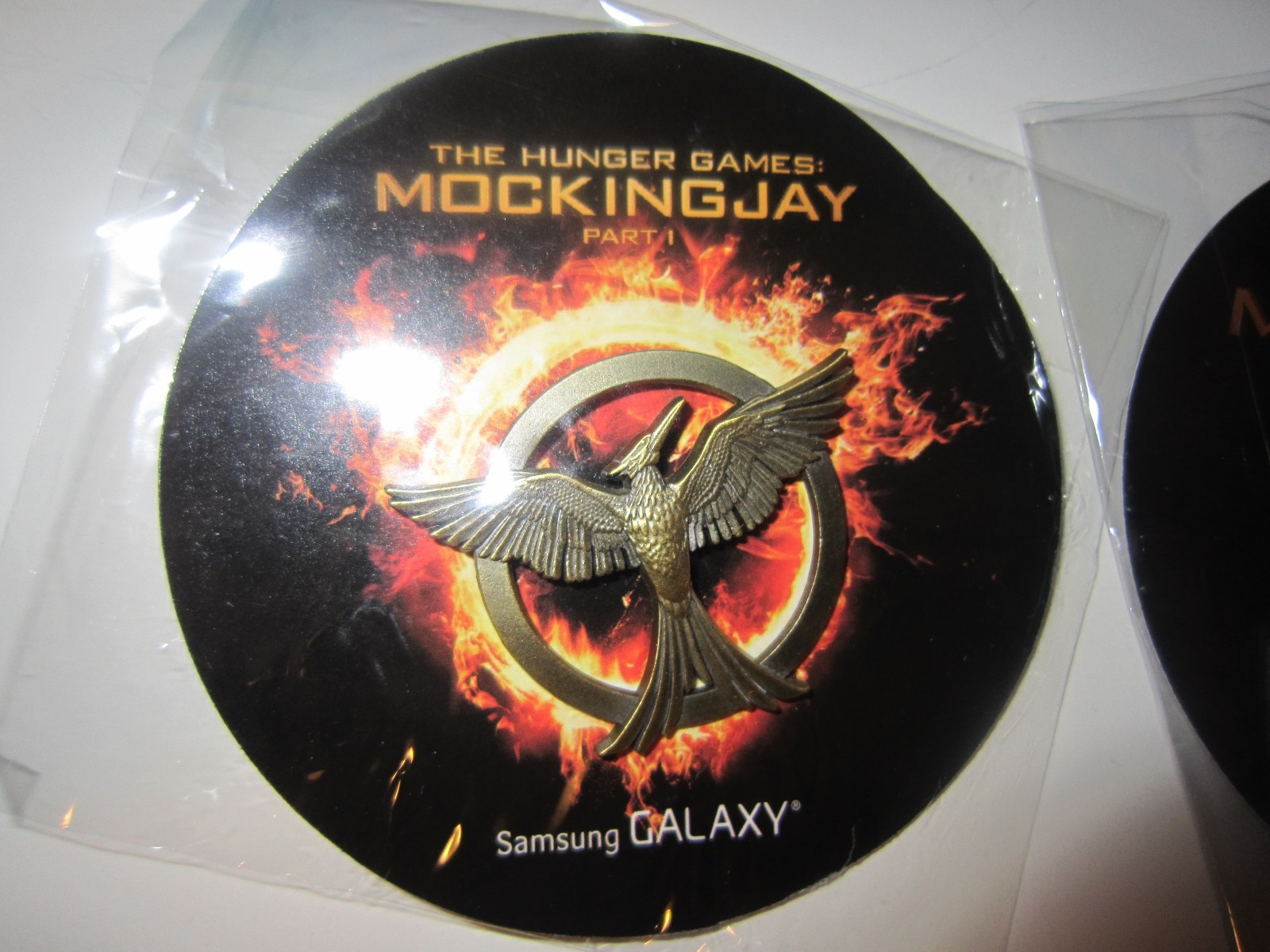 Mockingjay Pin On Fire Wallpaper