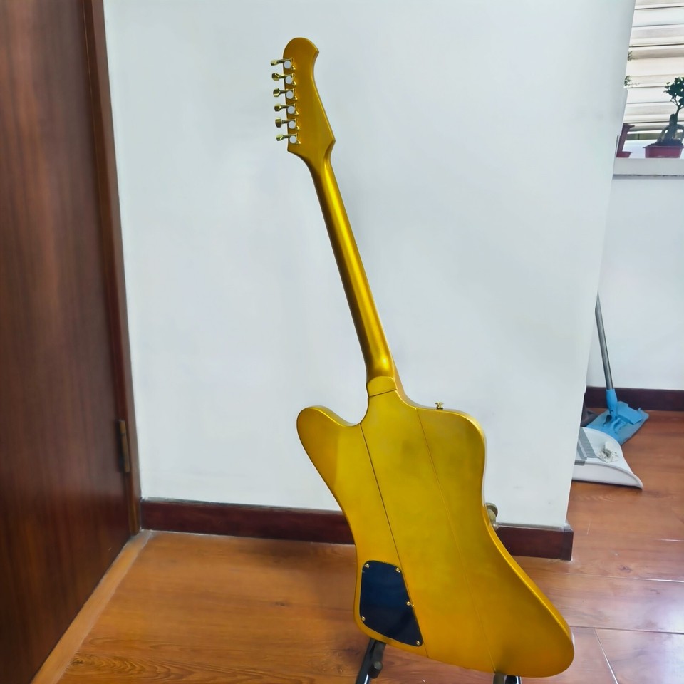 Custom Firebird gold electric guitar black fretboard, 2H pickups ...
