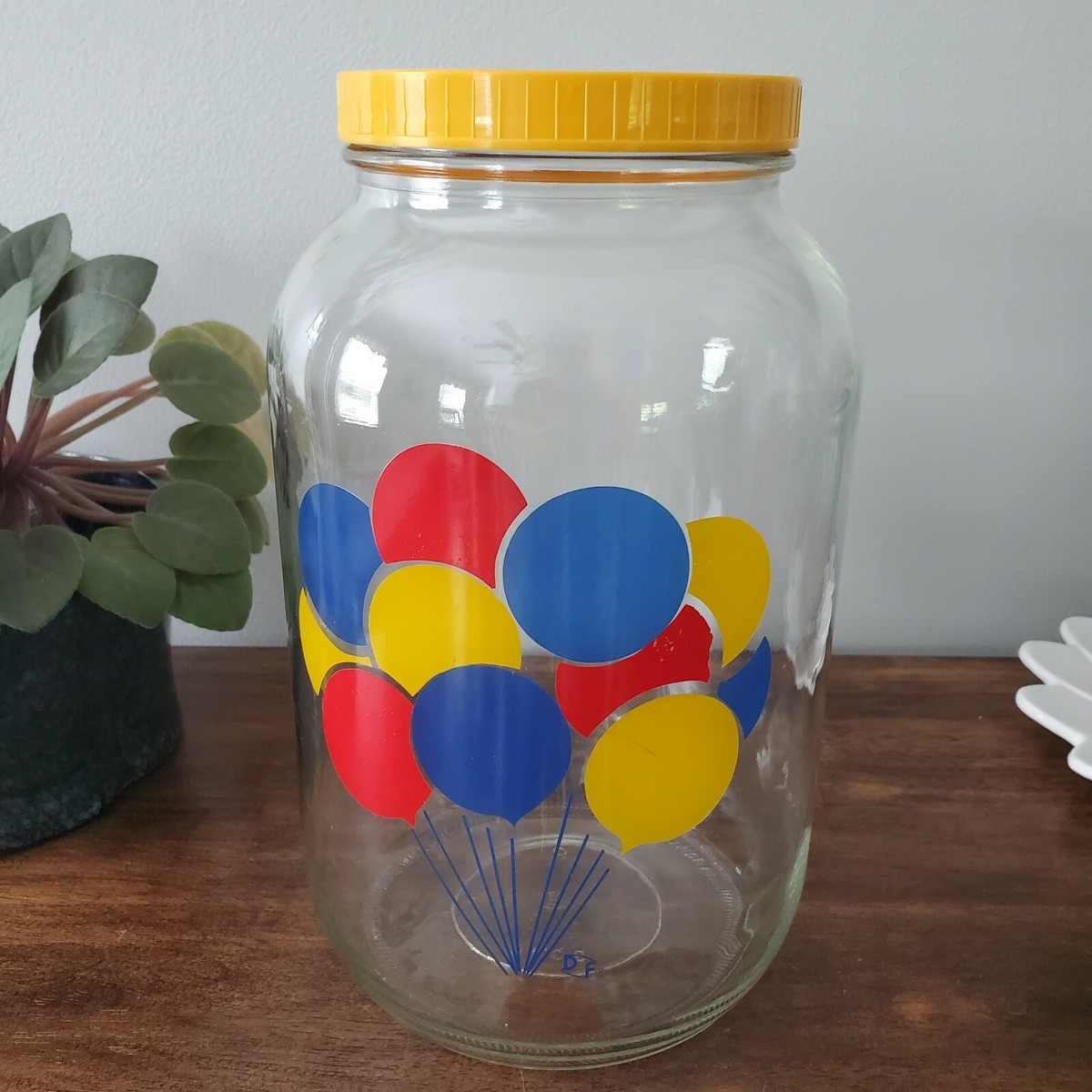 Balloons Around A Mason Jar Balloon Dipped Luminaries