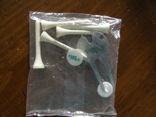 8919) 1 Pkg. "Pro Golf Discount" Logo: 1: Divot Tool 2: Ball Markers 5 ...