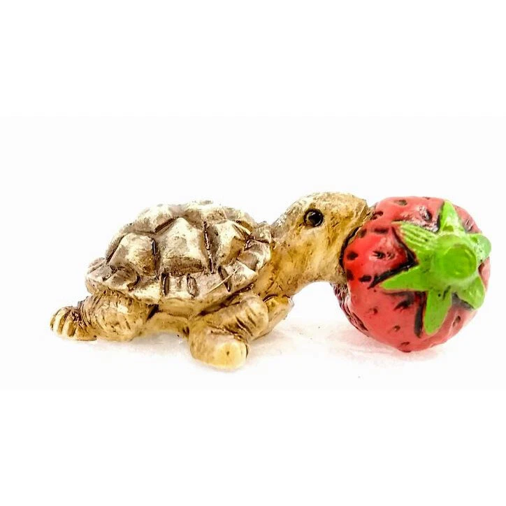 Baby Turtle Eating A Strawberry