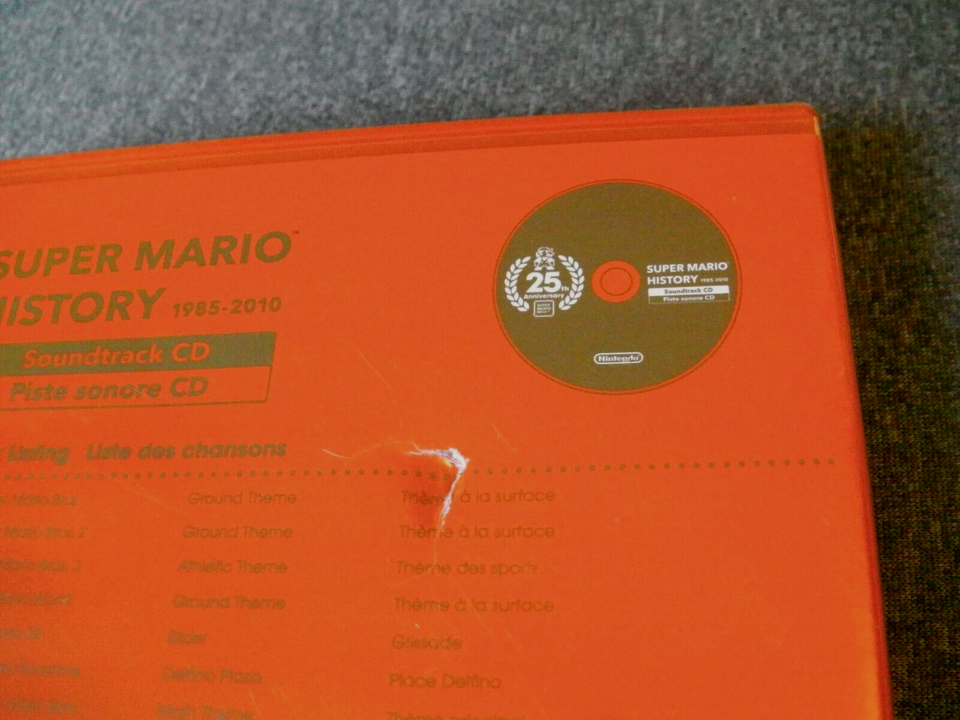 Super Mario: History 1985-2010 (CD, 2010, Nintendo) DAMAGED BACK COVER ...