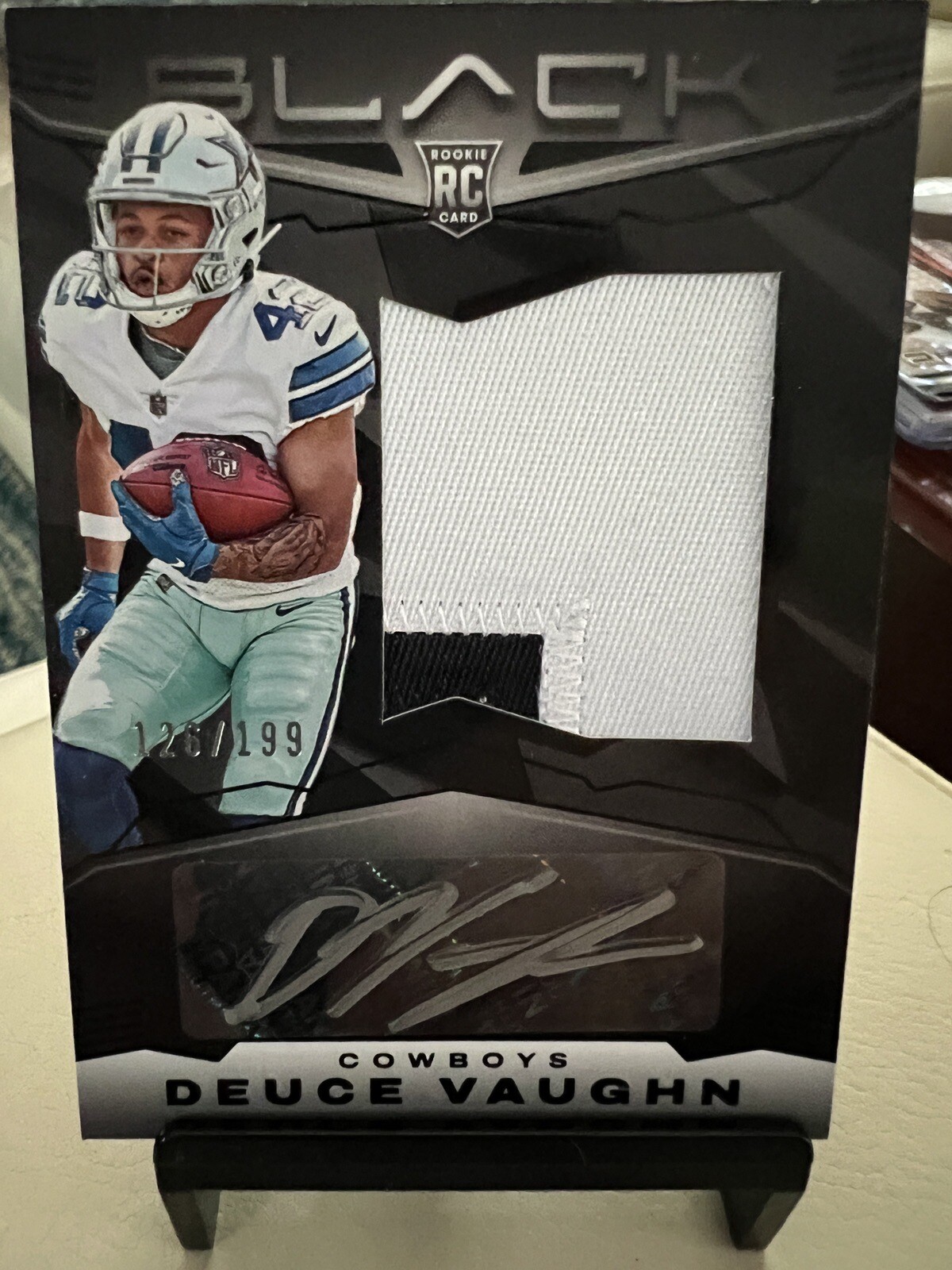 2023 Panini Black - Rookie Patch Autographs #240 Deuce Vaughn /199 (AU ...