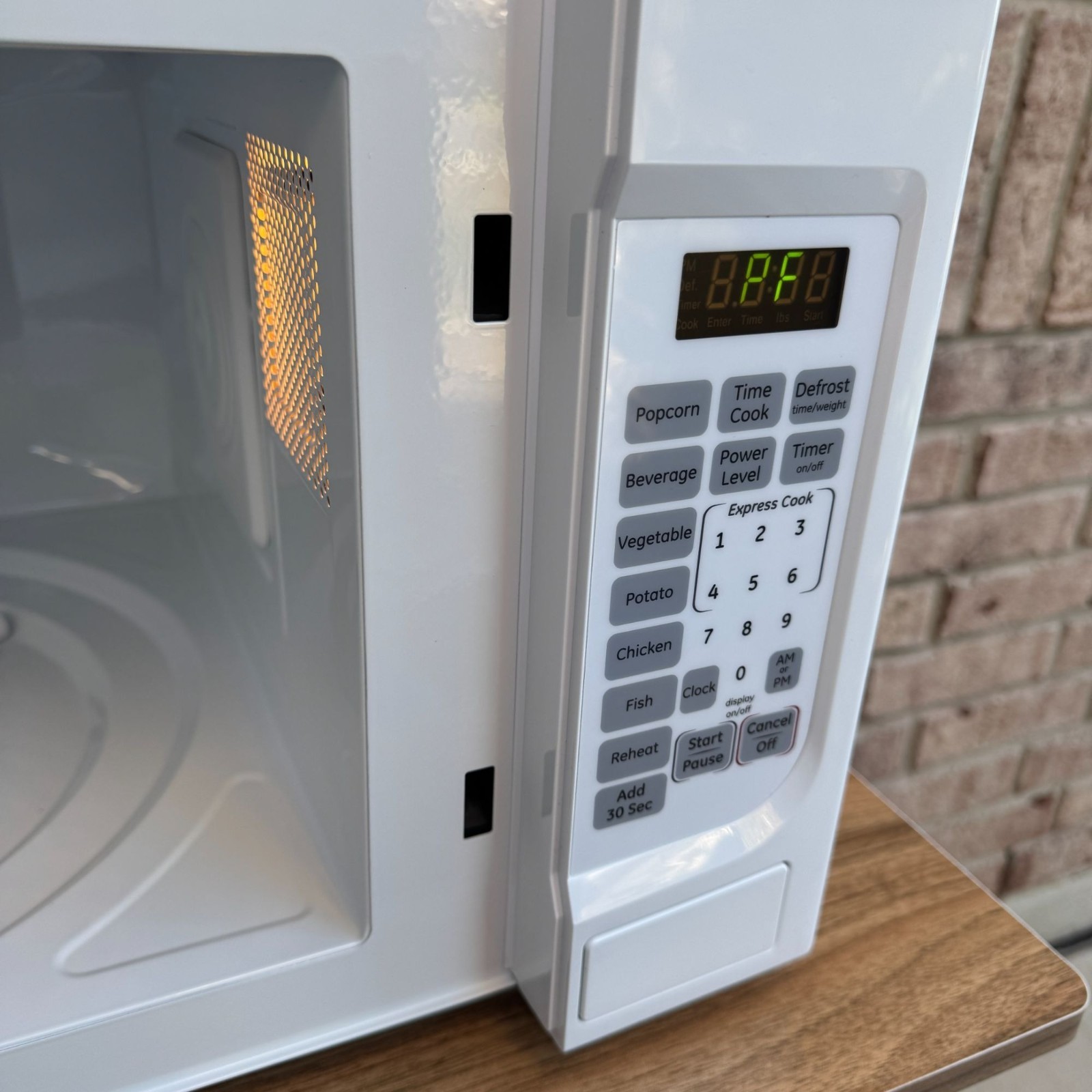 GE Countertop Microwave White 1.4 cu ft 1100W GCST14S1WWW Open Box Side ...