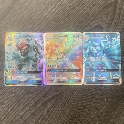 Trio bundle of Alolan Ninetales GX pokémon cards, 22/145, 150/145, 132/ ...