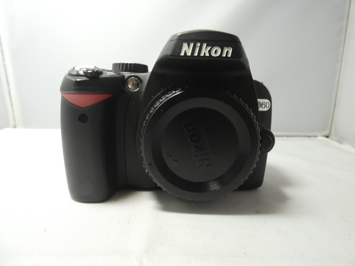 Nikon D D60 10.2MP Digital SLR w/ 18-55mm VR lens. Comes Nikon D D60 10.2MP Digital SLR w/ 18-55mm VR lens. Comes