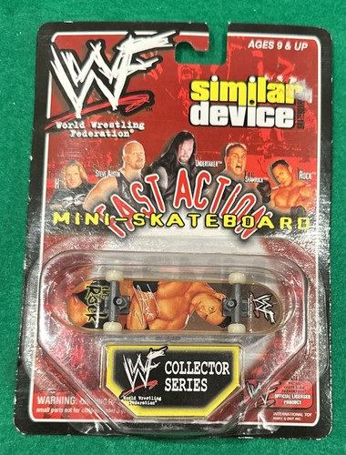 WWF Mini Skateboard Fast Action Similar Device The Rock New | eBay