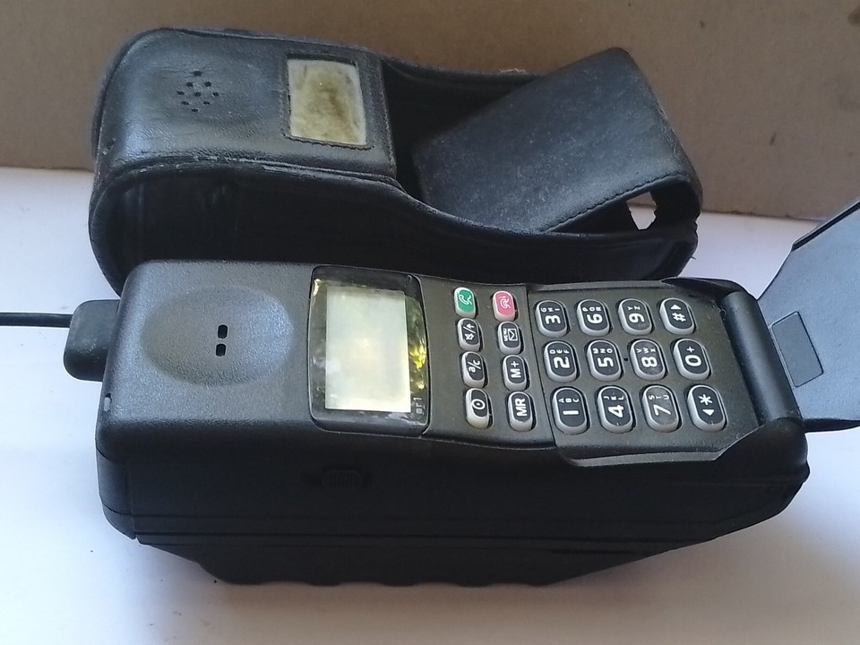 Vintage 1990s Old Retro mobile Phone Shop 0range Motorola flip with ...
