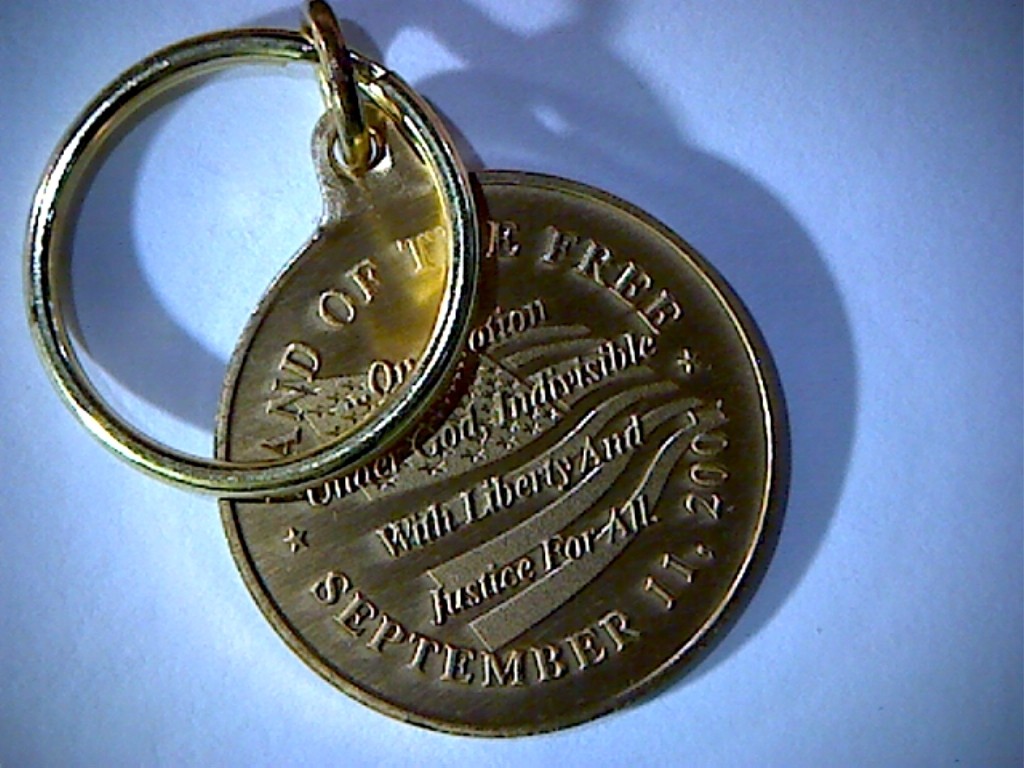 911 KEY CHAIN, LAND OF THE FREE, 9/11/2001, GREAT NATION STANDS UNITED ...