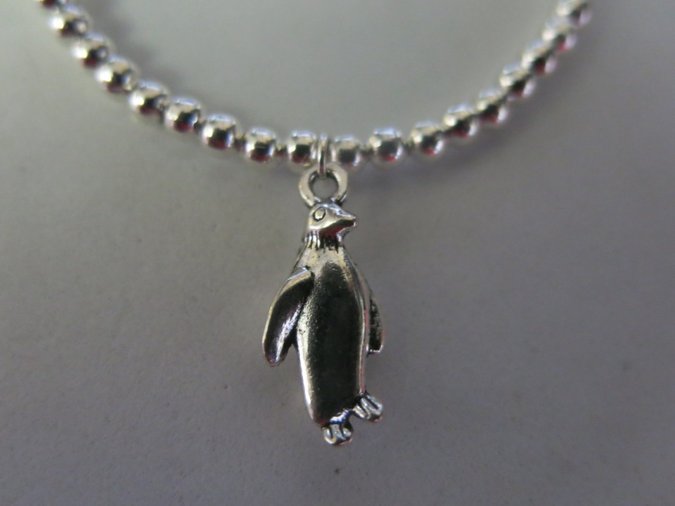 silver plated beaded stretch bracelet with cute penguin charm | eBay UK