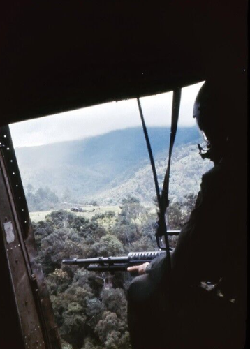Vietnam War Photos -- UH-1 Huey + Door Gunner | eBay