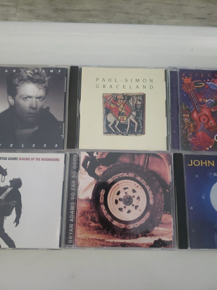 10 Cd Lot Thorogood,Bryan Adams,paul Simon,Fogarty,Santana,bad Company ...
