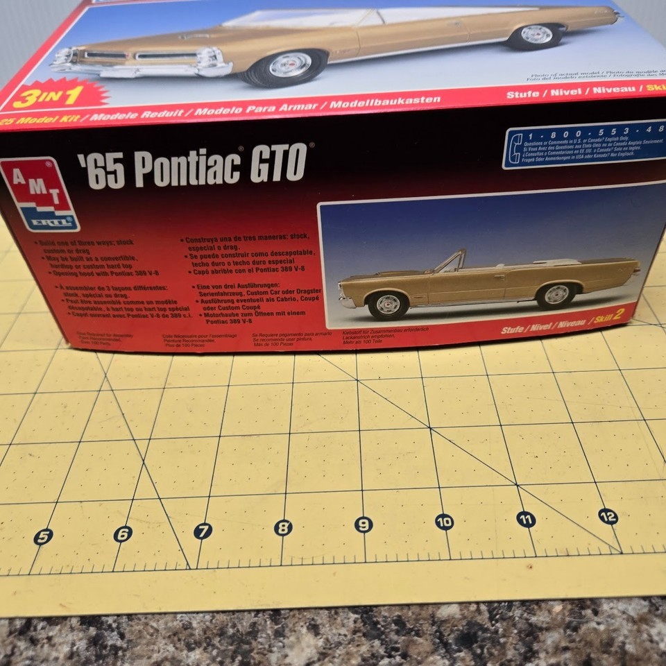 AMT 8201 1965 GTO Pontiac 3'n1 KIT Model Car Kit 1/25 Open Box | eBay