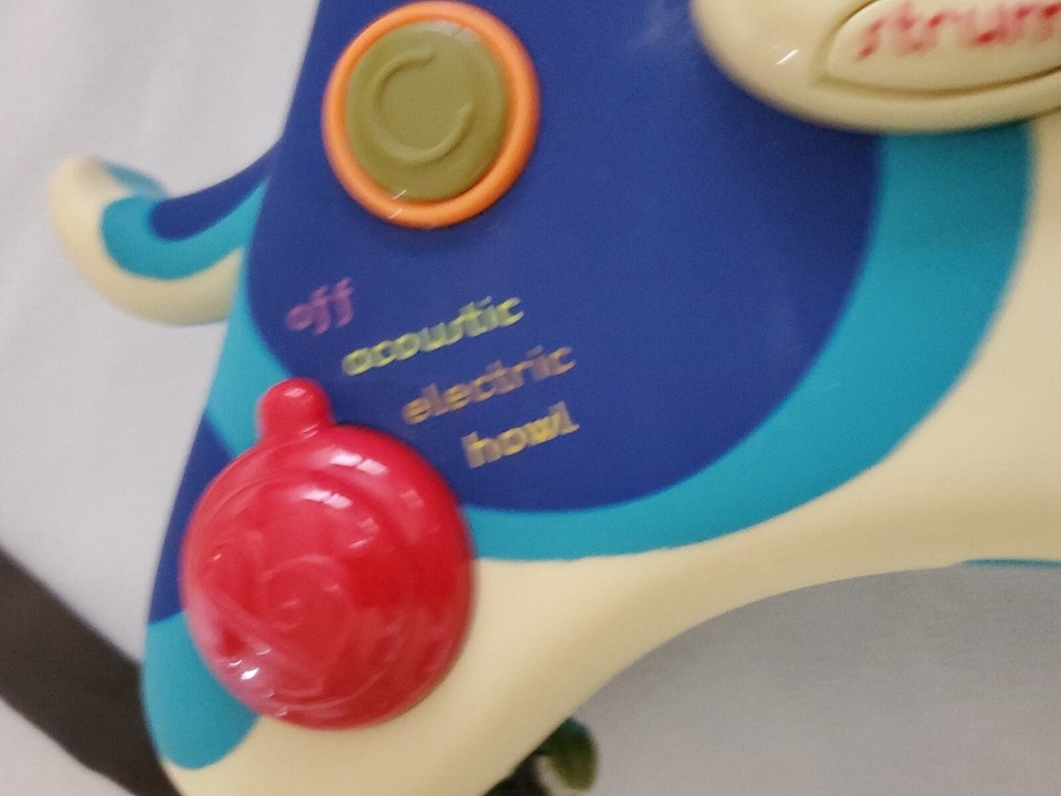 B. Woofer Hound Dog Guitar Battat Toys Strum B Dog Musical Learning ...