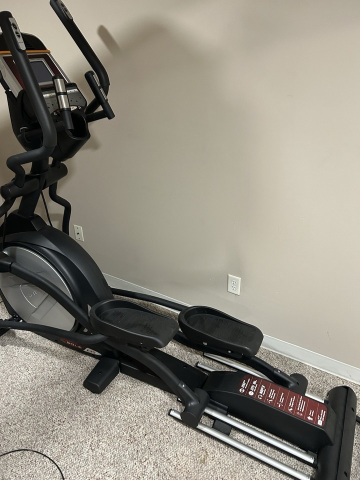 Sole E35 elliptical machine, featuring its digital display panel, dual ...
