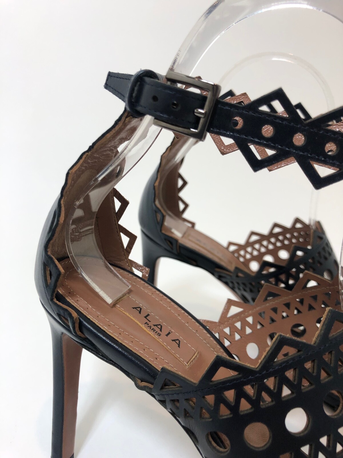 ALAÏA Leather Laser Cut Ankle Strap Sandals in Black … - Gem