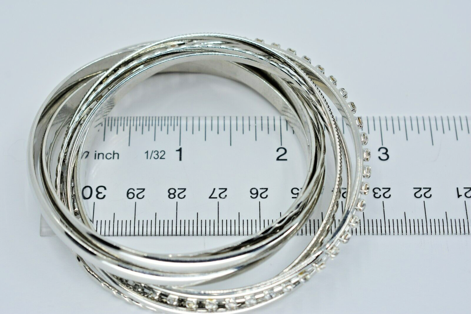 Bangle Bracelets Silver Tone Stack of 8 Connected Nice Bangle Bracelets ...