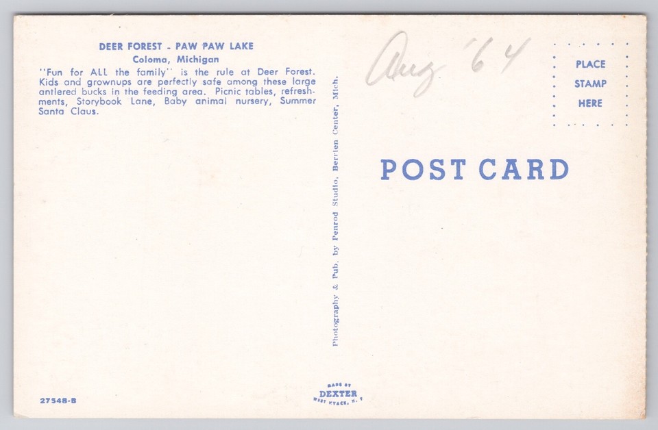 PEOPLE FEEDING THE DEER AT DEER FOREST, PAW PAW LAKE COLOMA MICHIGAN ...