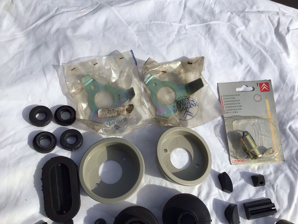 Citroen 2CV box of NOS parts: Hood Clamps,indicator bases,CV boots ...