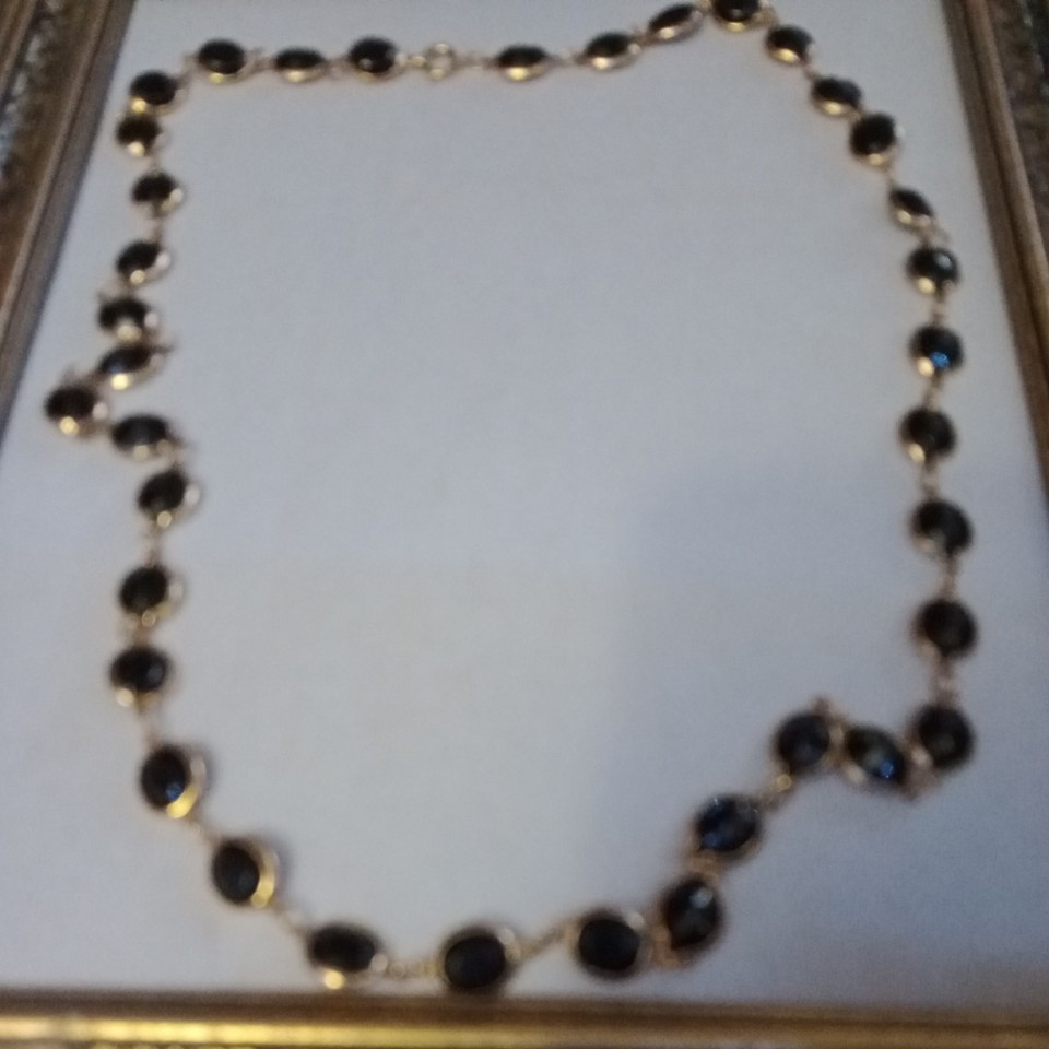 estate necklace. I am not a jeweler. so this is being sold as costume ...